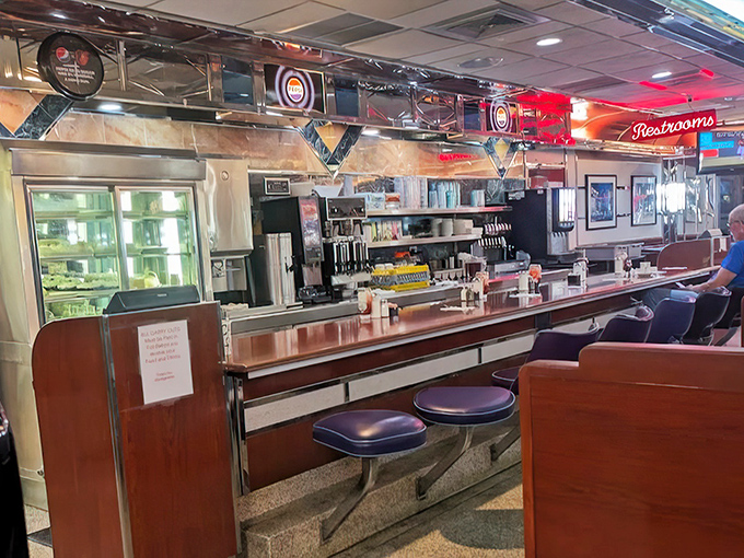 The counter experience&mdash;where solo diners become regulars, servers become friends, and breakfast becomes theater with a front-row seat to the action.