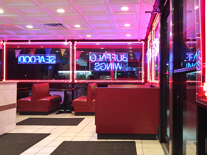 The neon glow transforms this simple eatery into a late-night sanctuary for the hungry and hopeful. 