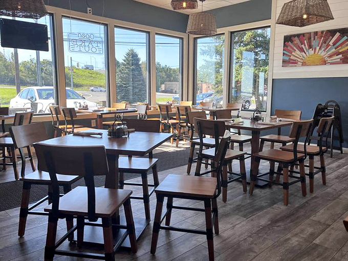 Ground floor seating offers mountain views through windows, making every meal feel like a scenic adventure.
