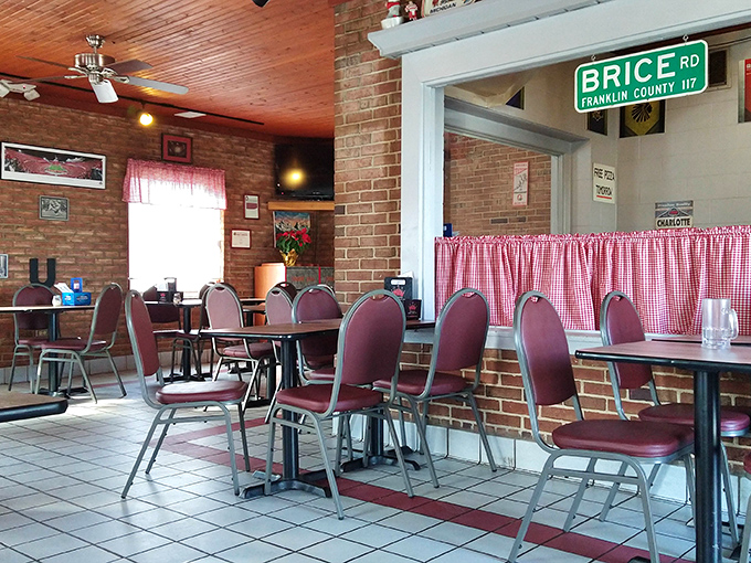 The Brice Road sign inside reminds you exactly where pizza paradise is located. Those checkered curtains whisper of simpler, delicious times. 