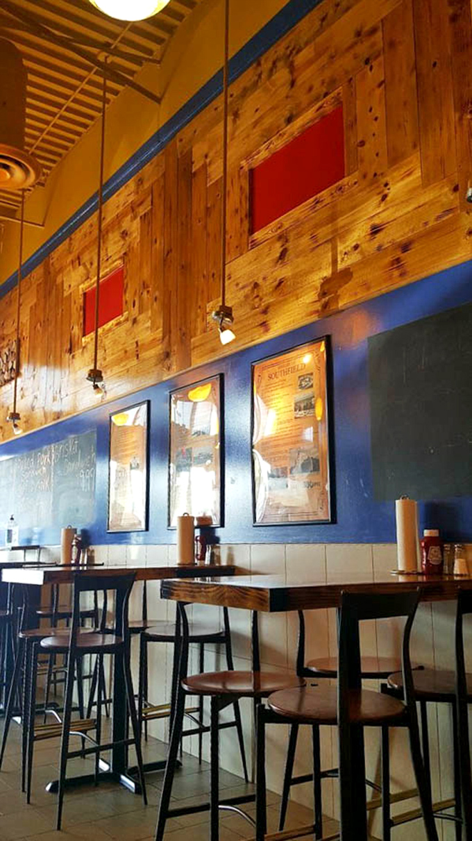 Wood paneling meets blue walls in a space that says, "We're serious about barbecue, not interior design"&mdash;exactly as it should be.
