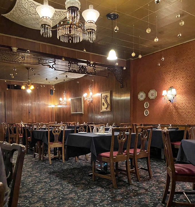 Crystal chandeliers and ornate ironwork overhead &ndash; dining at Guarino's feels like being invited to Sunday dinner at a particularly elegant Italian grandmother's home.