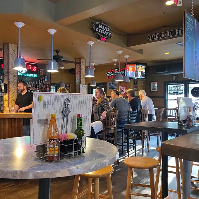 Wooden tables, comfortable chairs, and that perfect neighborhood joint lighting where everyone somehow looks their best while digging into seafood.