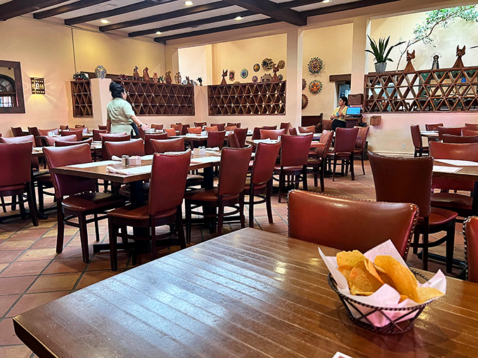 Empty chairs that won't stay empty for long. The basket of chips on the table is like a welcome mat saying, "Prepare for deliciousness."