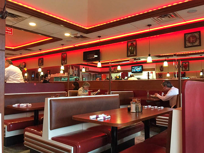 The red booths aren't just seating &ndash; they're front-row tickets to the greatest show on earth: breakfast served all day.