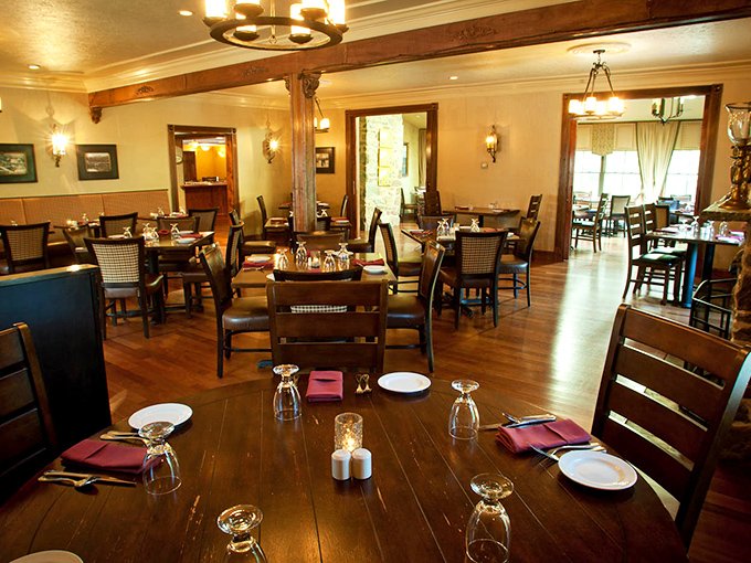 The main dining room where rustic meets refined, proving that exceptional food deserves an equally impressive setting.