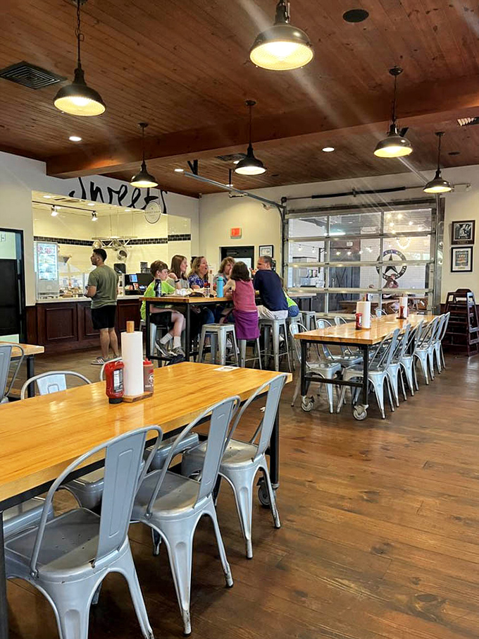 The dining room where strangers become friends united by the universal language of "mmm" and "pass the napkins, please."