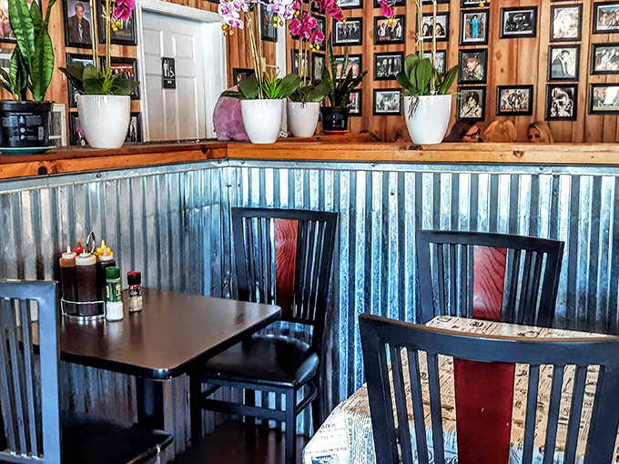 Corrugated metal meets warm wood paneling in a space that says, "Stay awhile, there's no rush&mdash;except to decide what to order next."