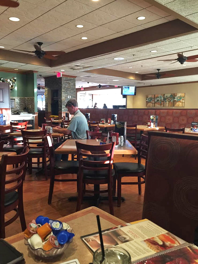 The dining room where breakfast dreams come true and "just coffee" orders turn into full pancake stacks with suspicious regularity.