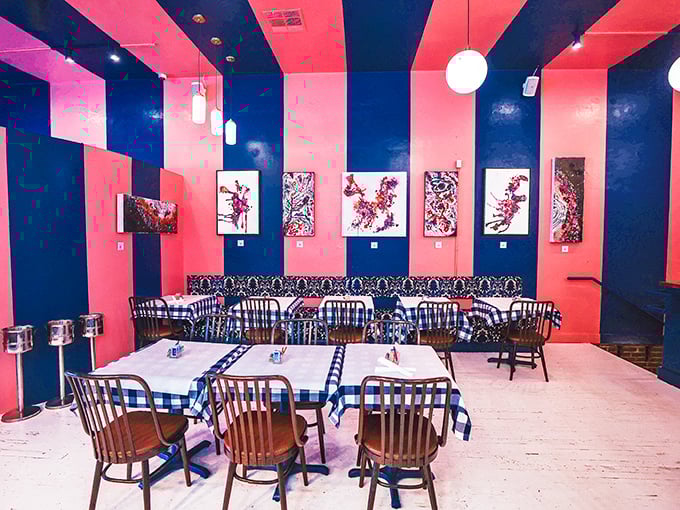 Bold stripes of coral and navy create a dining space that's equal parts energizing and comforting&mdash;just like their coffee.