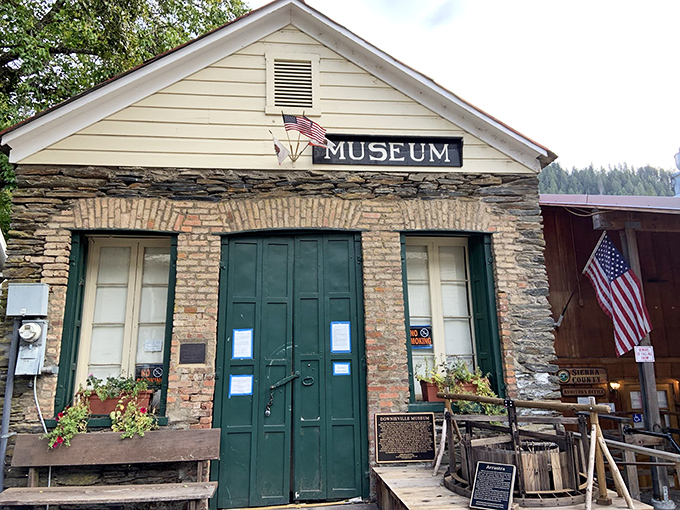 The Downieville Museum's stone facade has witnessed more California history than most textbooks cover, all packed into one charming building.