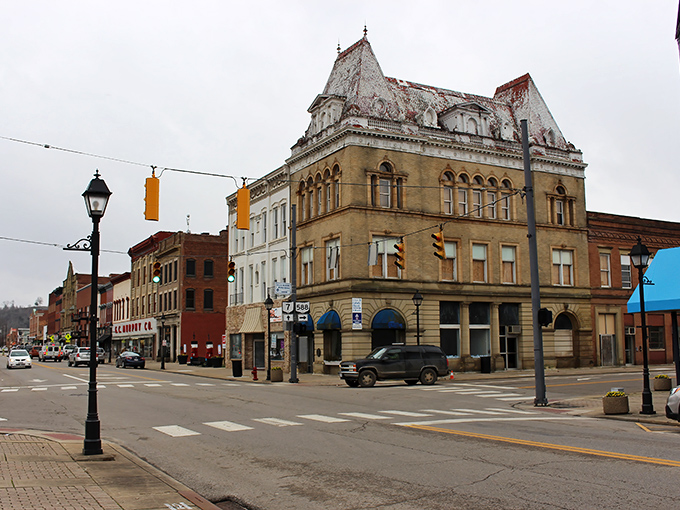 Imposing architecture anchors this downtown corner, where ornate stonework tells of an era when small-town banks and businesses built to impress for centuries.