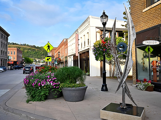 Colorful planters and public art punctuate downtown streets, proving that in Red Wing, even the sidewalks deserve thoughtful decoration.