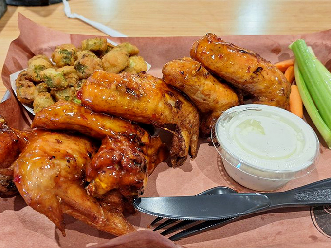 Dragon sauce wings: where smoke meets heat in a flavor tango that'll have you reaching for both napkins and another order.