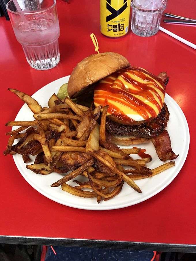 The Dude Ranch Burger with its crown of crispy onion strings and drizzle of sauce is what would happen if a cowboy became a gourmet chef.