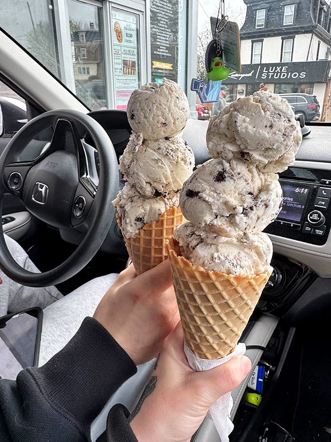Car dashboard dining at its finest. Four scoops of cookies and cream&mdash;one for the road and three because life is short.