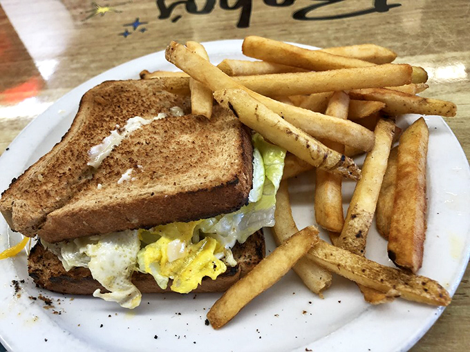 The breakfast sandwich that makes all others look like underachievers. Those golden fries aren't sidekicks &ndash; they're co-stars in this morning masterpiece.
