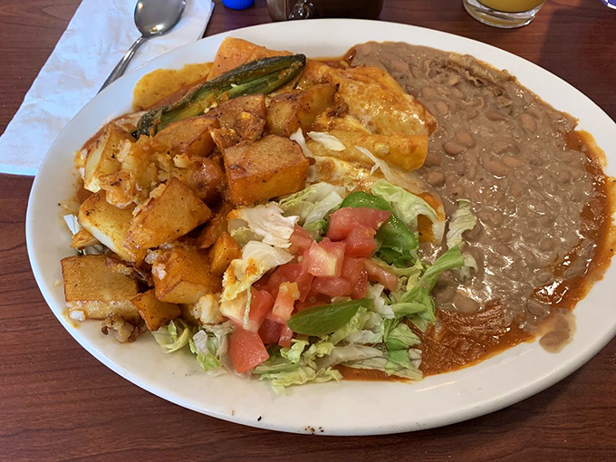 Enchiladas Michoacanas with that sunset-orange sauce&mdash;like a warm hug from someone who really knows how to cook.