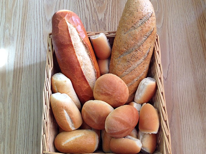 A bread basket that belongs in a museum of carbohydrate perfection. From crusty baguettes to pillowy rolls, this is carb heaven.