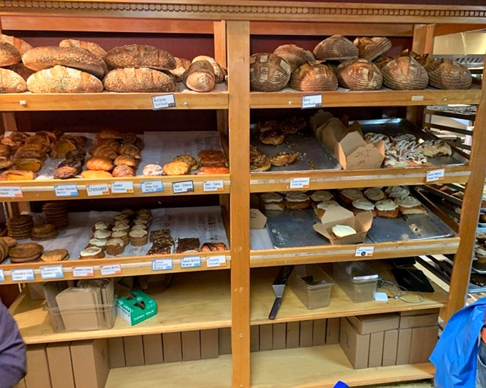 Artisanal bread loaves stacked like edible sculptures. The kind that make you contemplate driving two hours just for a proper sandwich.