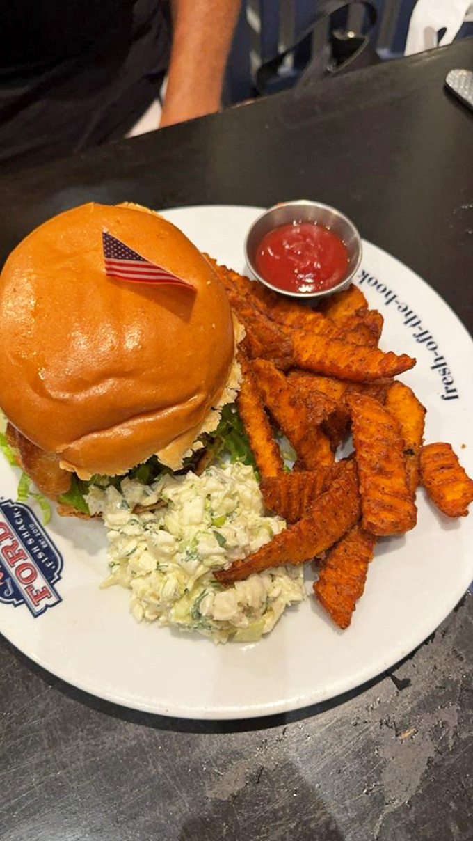This sandwich waves its tiny American flag with patriotic pride, as if to say, "This is what freedom tastes like &ndash; with a side of slaw."