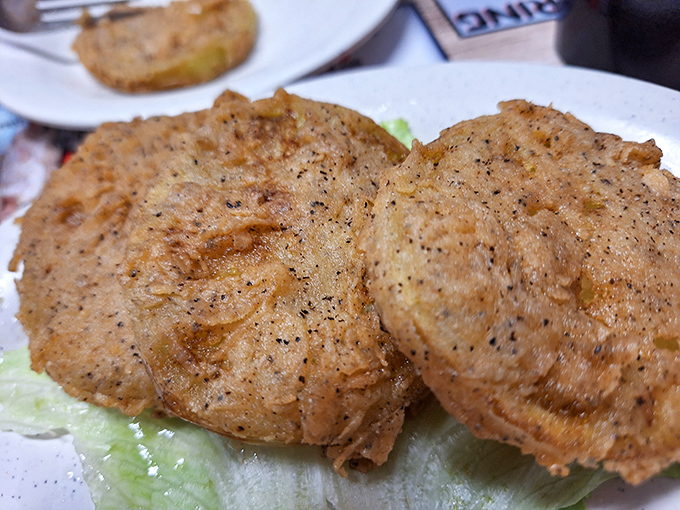 Crispy fried green tomatoes that deliver that perfect tangy-savory one-two punch that makes you wonder why we ever bother eating red ones.
