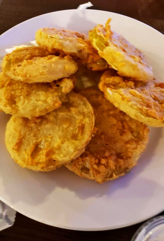 Fried discs of golden perfection that could convert any vegetable skeptic. Crispy outside, tender inside—the texture contrast is pure genius.