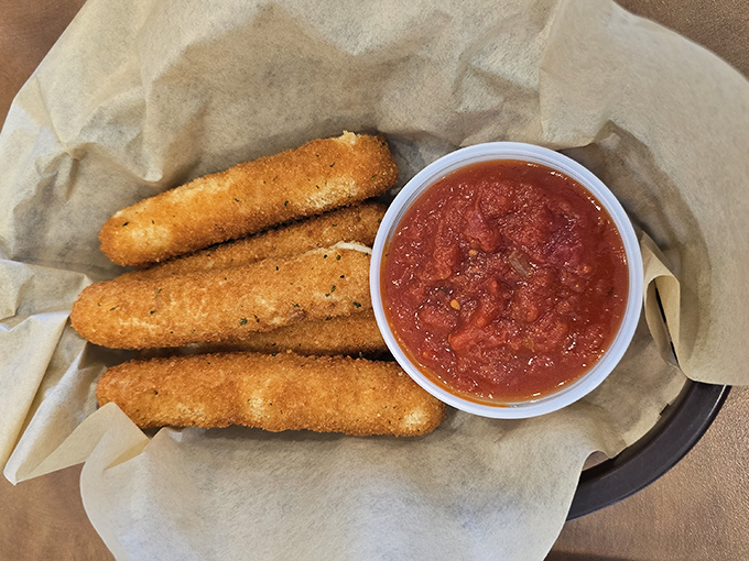 These cheese sticks aren't just appetizers, they're an event&mdash;golden-brown sentinels guarding a pool of marinara that begs for a dramatic dip.