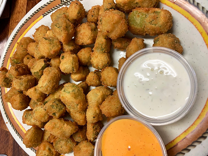 Fried okra that even okra skeptics will devour, with dipping sauces that make these golden nuggets disappear faster than you can say "seconds."