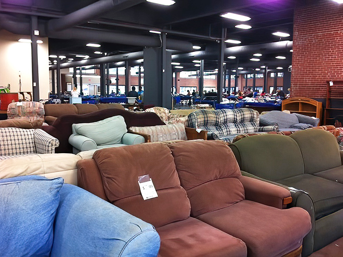 Sofa city! A lineup of perfectly usable couches waiting for their second chance at supporting someone's Netflix marathons and afternoon naps.
