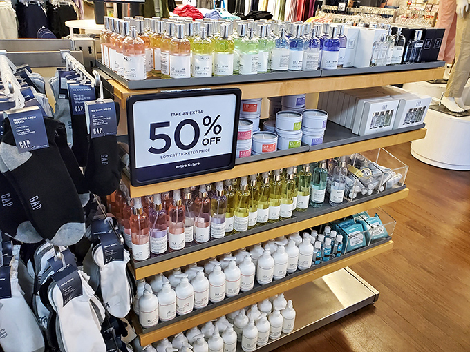 The rainbow of Gap fragrances and body products stands at attention. That "Take an extra 50% off" sign is the retail equivalent of a siren's call.