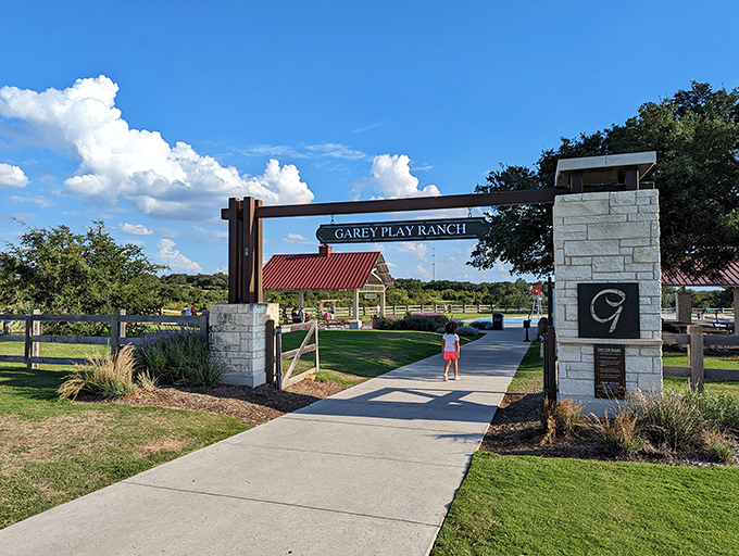 Garey Play Ranch welcomes visitors with limestone pillars and Texas-sized hospitality&mdash;the kind of entrance that says "y'all are gonna love this place."