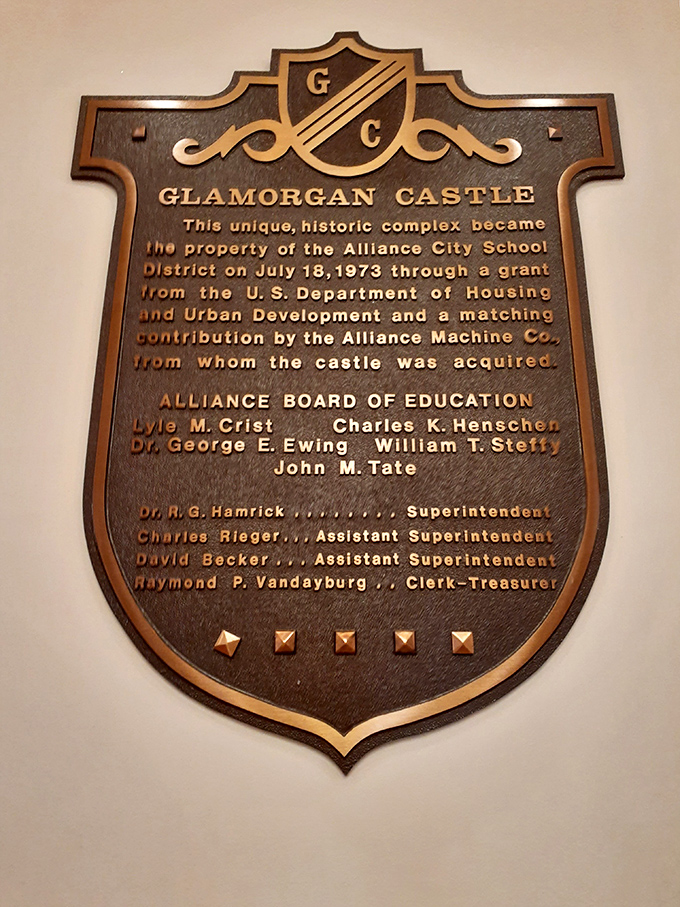The castle's commemorative plaque reveals its second act as Alliance's most distinguished school administration building&mdash;homework has never been so grand!