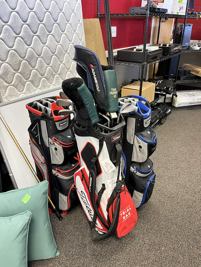 Golf bags standing at attention like soldiers of leisure, each one holding the dreams of perfect fairways and miraculous hole-in-ones.
