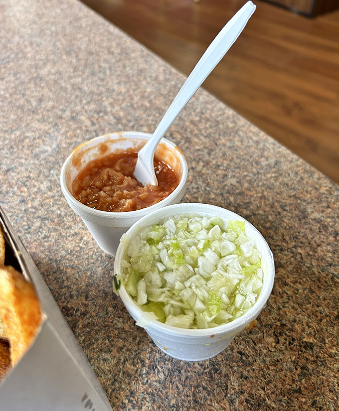 The famous hot sauce and coleslaw up close - humble side dishes that have achieved cult status among Ohio food pilgrims.