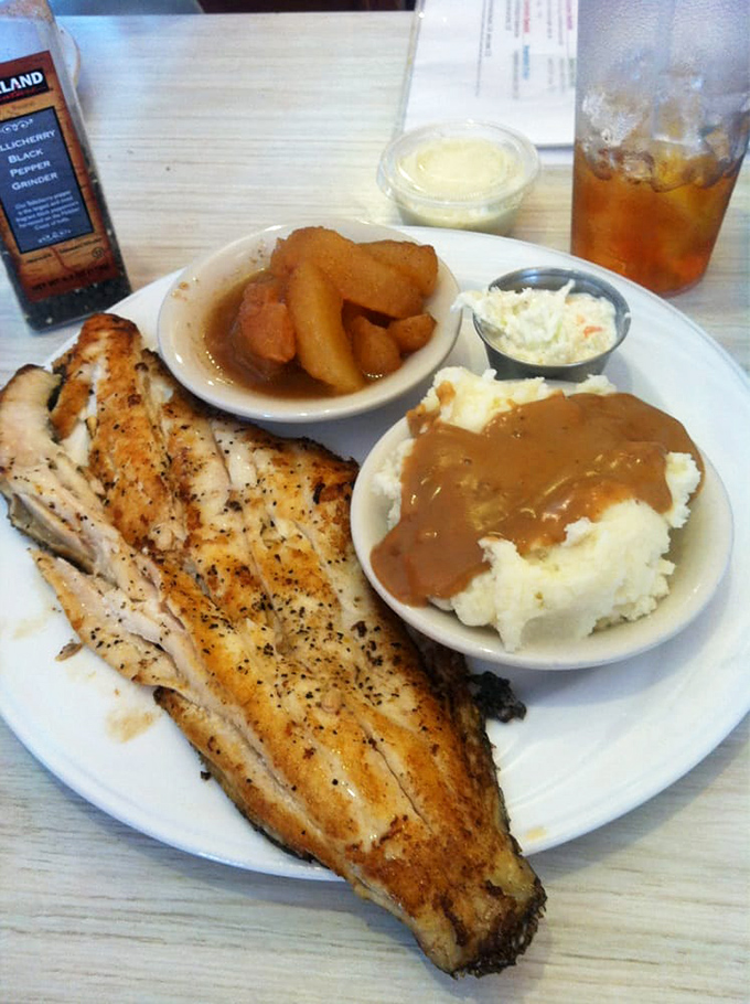 A perfectly grilled flounder filet alongside cinnamon apples and creamy mashed potatoes&mdash;proof that balance isn't just for yoga enthusiasts.