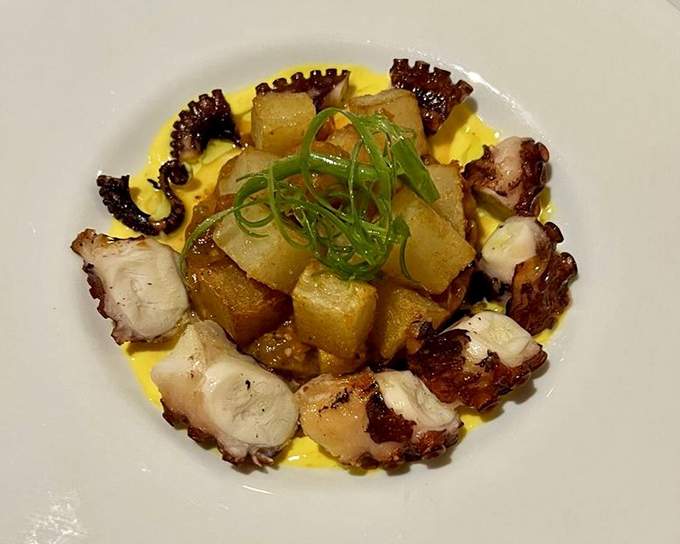 Octopus and potatoes playing nicely together in a dish that says, "Yes, this is a steakhouse, but we respect seafood too."