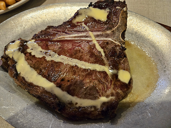 When an Italian restaurant serves a steak this good, it's like finding out your favorite singer can also tap dance. The Alfredo sauce river adds a delicious plot twist.