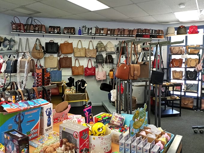 Handbag heaven where designer-inspired meets vintage classics. The pegboard display creates a leather and vinyl tapestry that beckons to accessory enthusiasts of all budgets.