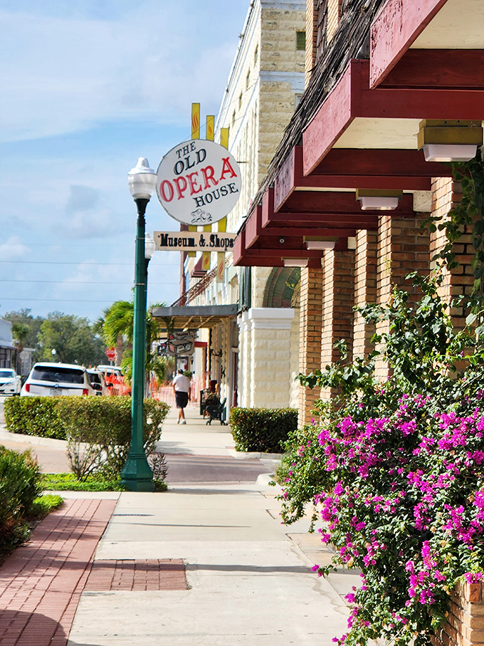 The Opera House sign swings gently in the Florida breeze, a reminder that culture has always found its way to even the smallest American towns.