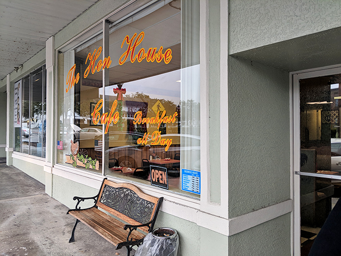 The Hen House Cafe's welcoming bench invites you to rest your feet before filling your stomach with homestyle comfort food.