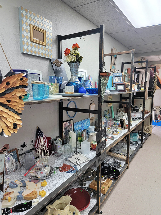 Curated chaos at its finest&mdash;shelves of glassware, frames, and knickknacks await their second chance to shine in someone's carefully styled bookcase.