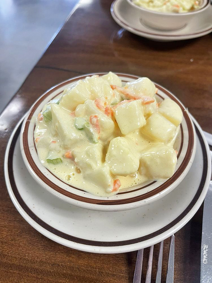Potato salad that looks like it has stories to tell&mdash;creamy, chunky, and studded with bits of carrot that add both color and character.