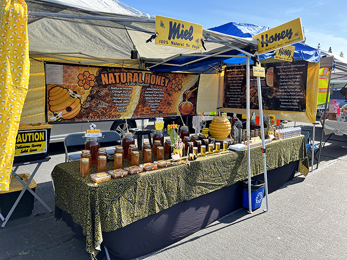 Swap meet vendors bring their A-game with displays like this honey stand&mdash;proving the drive-in's double life offers sweet deals by day.