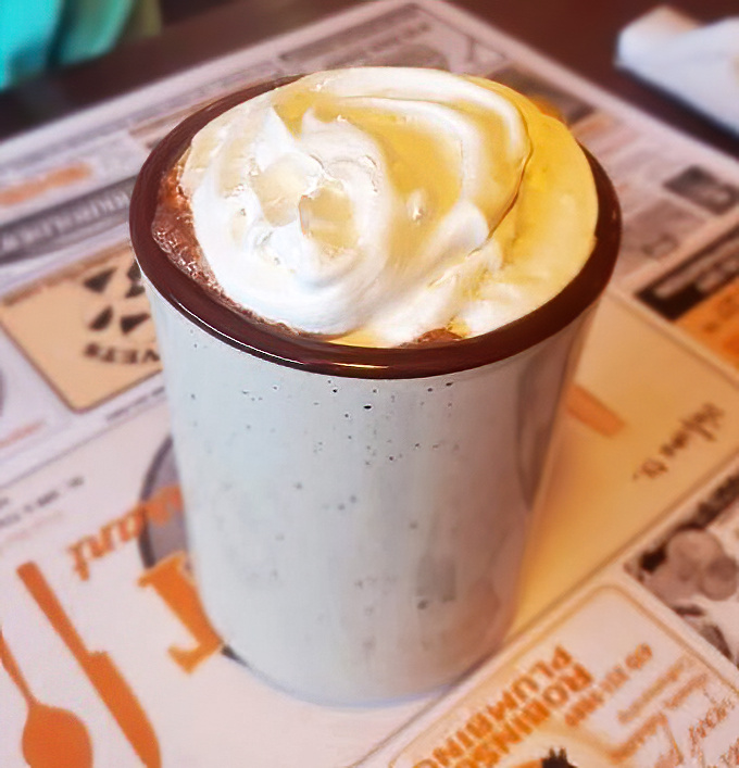 Hot chocolate that understands its mission in life: to warm Pennsylvania winters with a cloud of whipped cream that demands a mustache selfie.