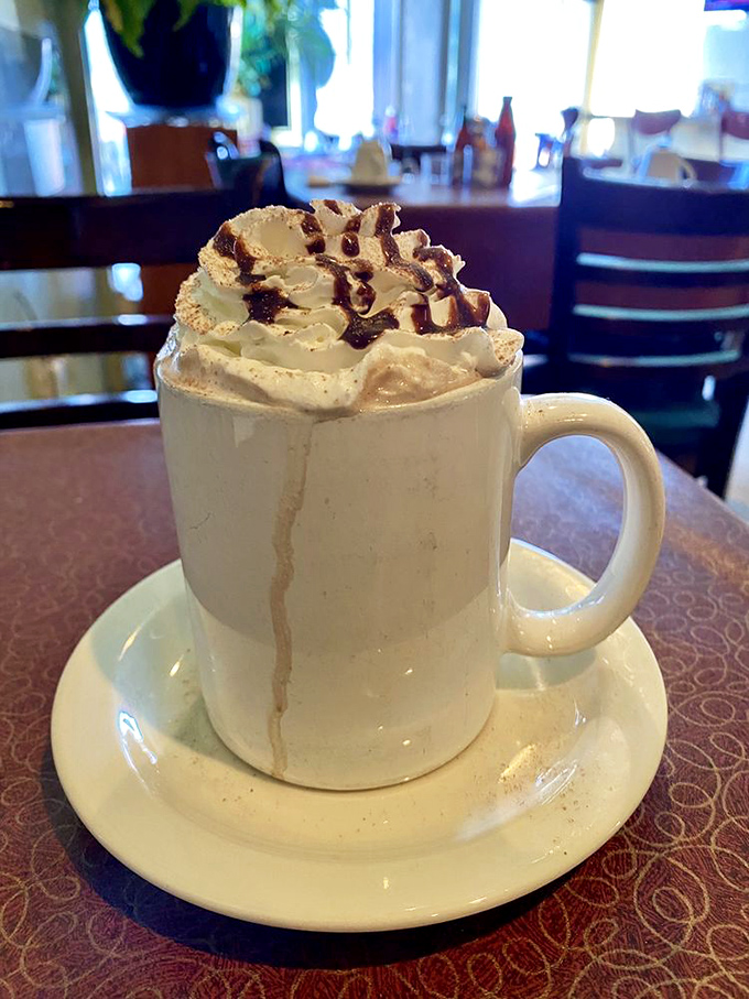 Hot chocolate that makes Swiss miss the point &ndash; topped with whipped cream mountains that deserve their own topographical map.