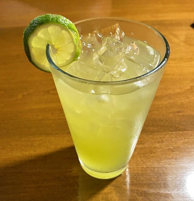 A margarita with the perfect lime-to-ice ratio sits ready to wash away your workweek troubles &ndash; liquid sunshine in a glass.