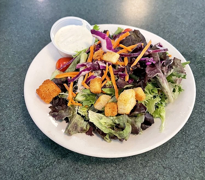 A house salad that doesn't apologize for being healthy. Fresh, colorful, and crisp—the supporting actor that sometimes steals the show.