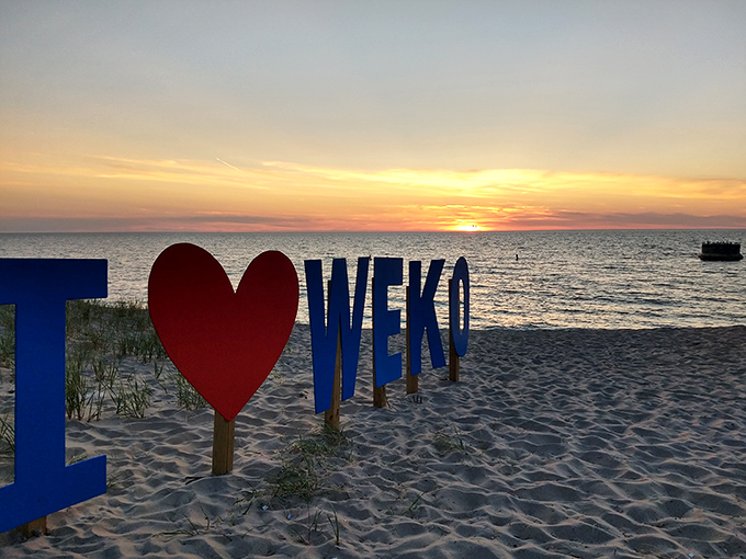 The "I ❤️ WEKO" sign captures what happens to visitors after just one sunset here &ndash; instant, irrevocable beach romance.