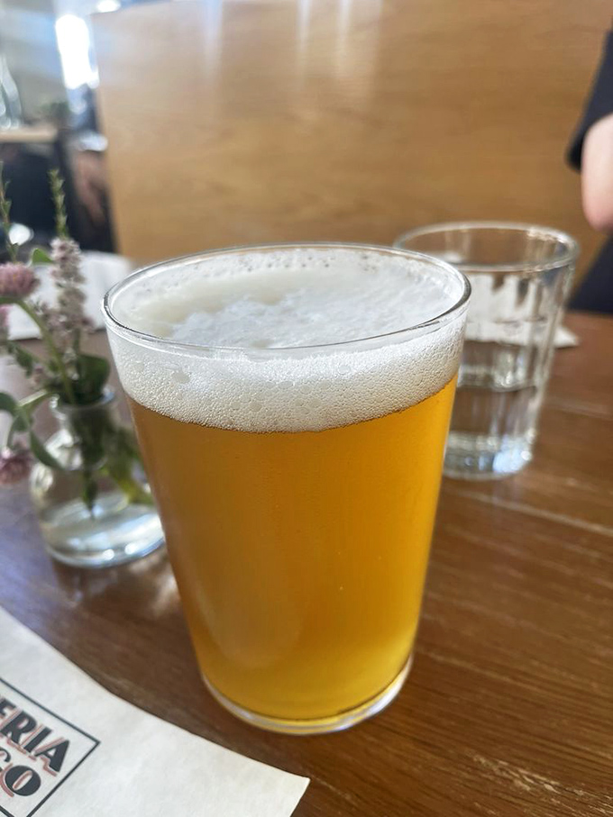 Golden, frothy, and perfectly poured&mdash;this craft beer is the liquid equivalent of a supporting actor who steals the scene from the pizza.